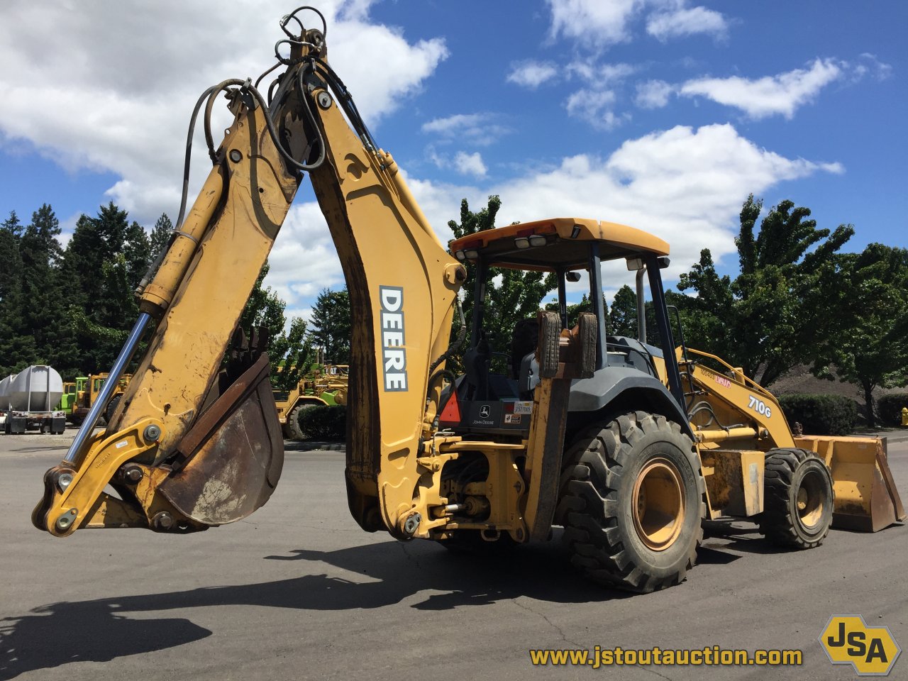 For Sale: 2004 John Deere 710G Loader Backhoe